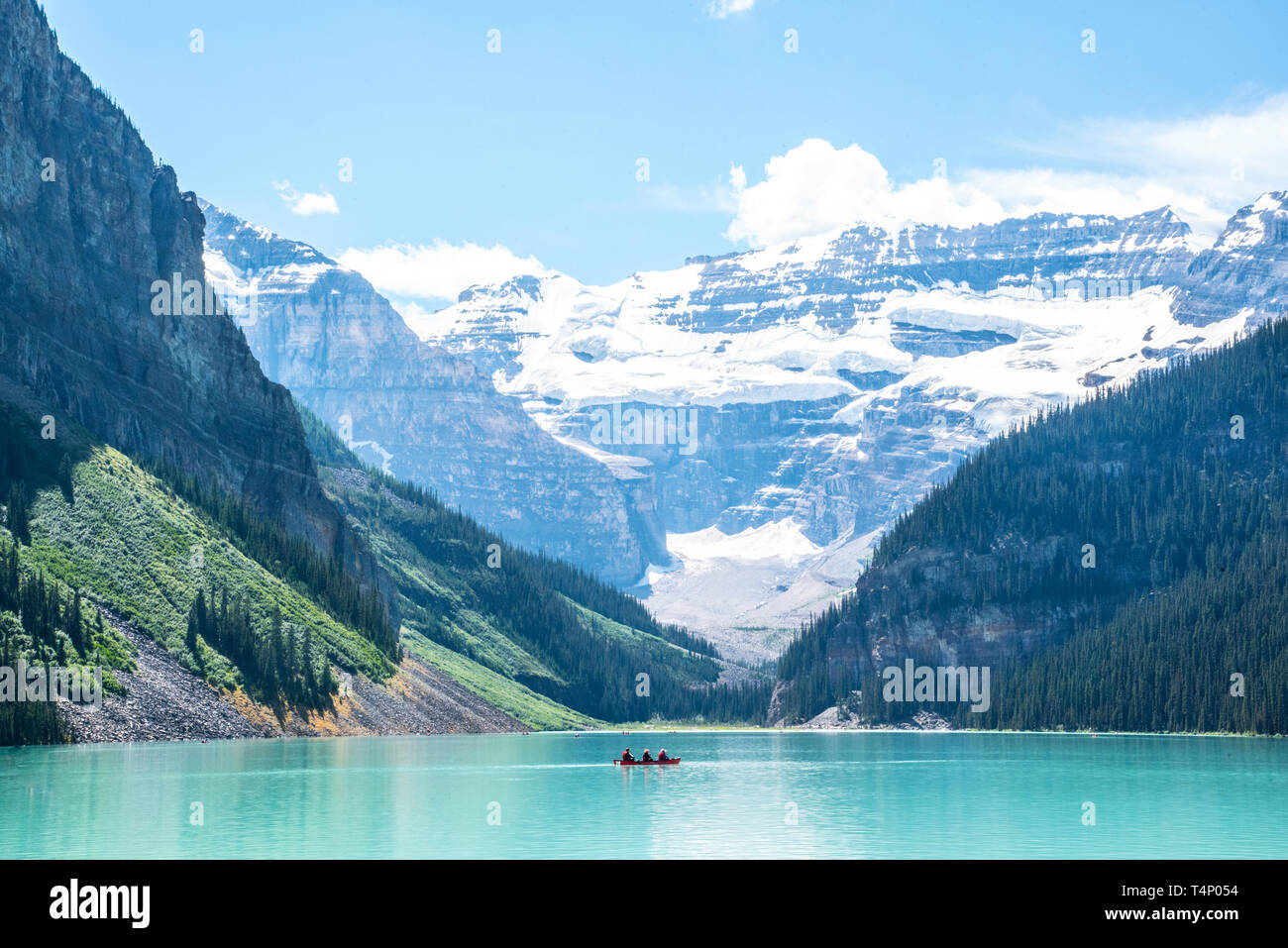 People In Canoe In Front of Mountain In Jasper and Banff National Park ...