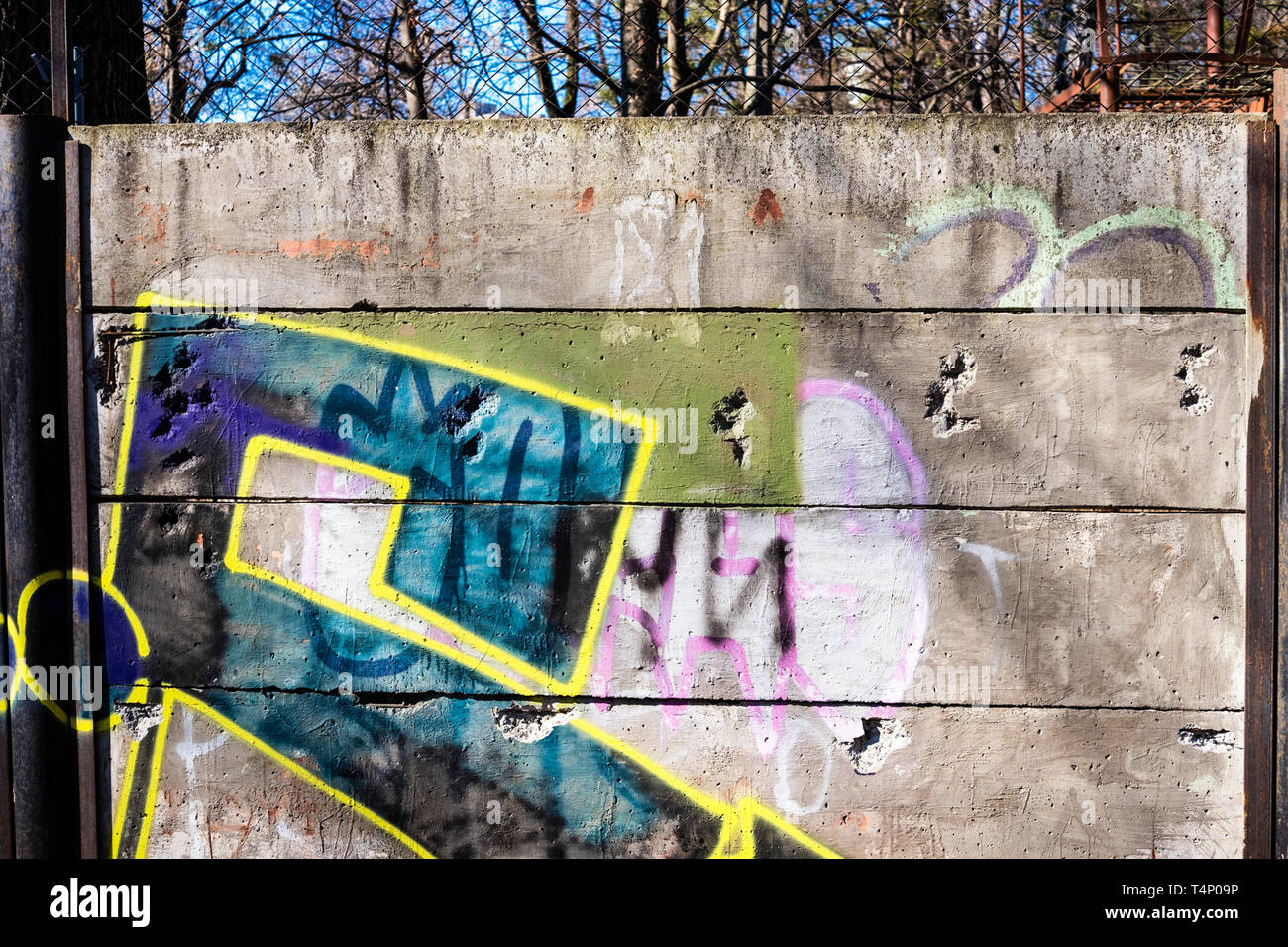 Bullet-ridden concrete wall Stock Photo - Alamy