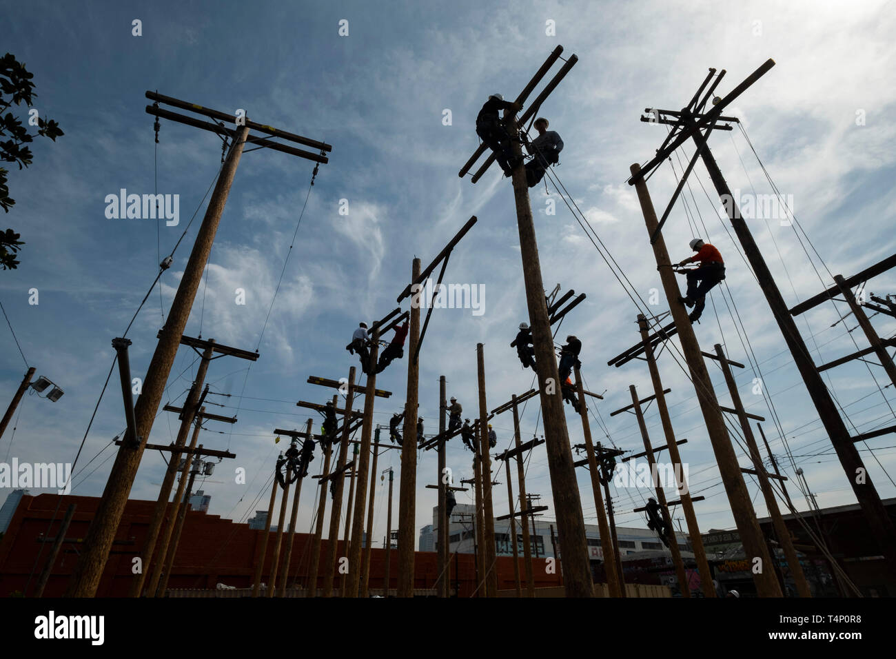 Learning the trade. Construction, Line workers. Downtown Los Angeles ...