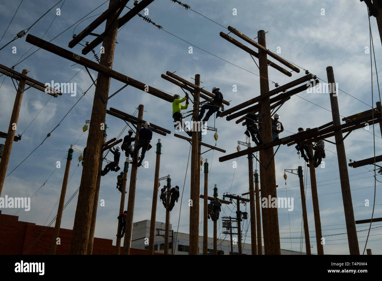Learning the trade. Construction, Line workers. Downtown Los Angeles ...