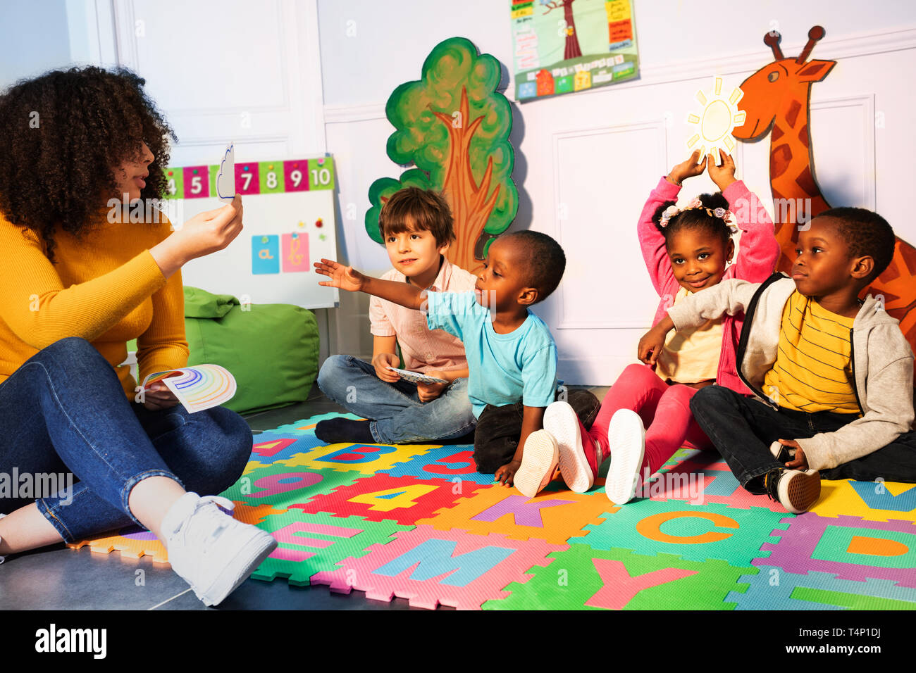 Kindergarten games teacher hi-res stock photography and images - Alamy