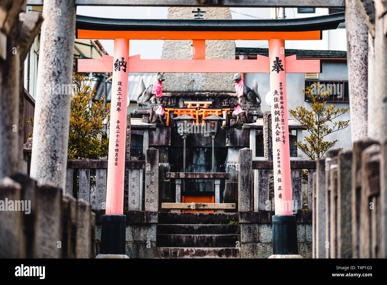 Orange gates and objects at Fushimi Inari-Taisha Shrine in Kyoto, Japan ...