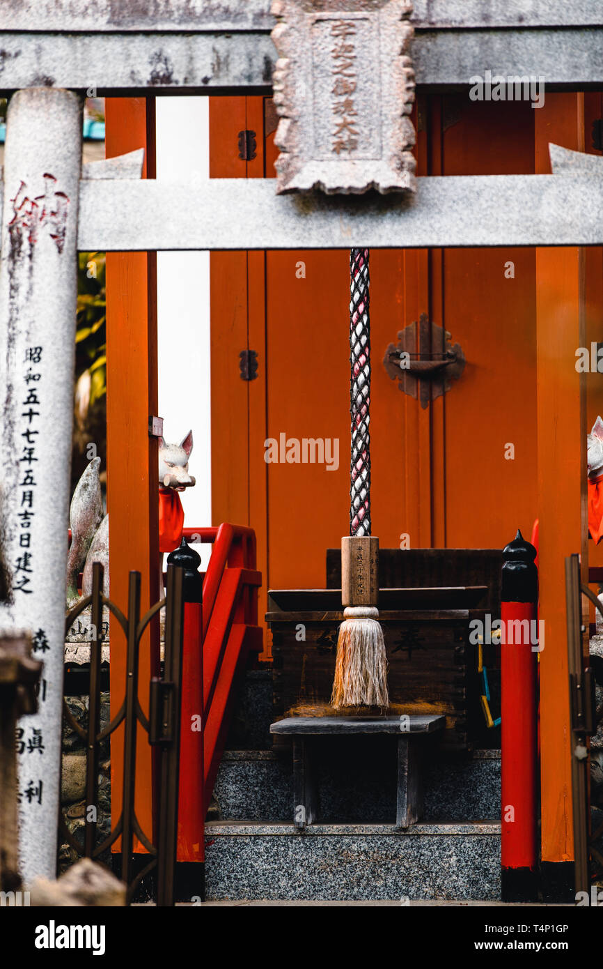 Orange gates and objects at Fushimi Inari-Taisha Shrine in Kyoto, Japan ...