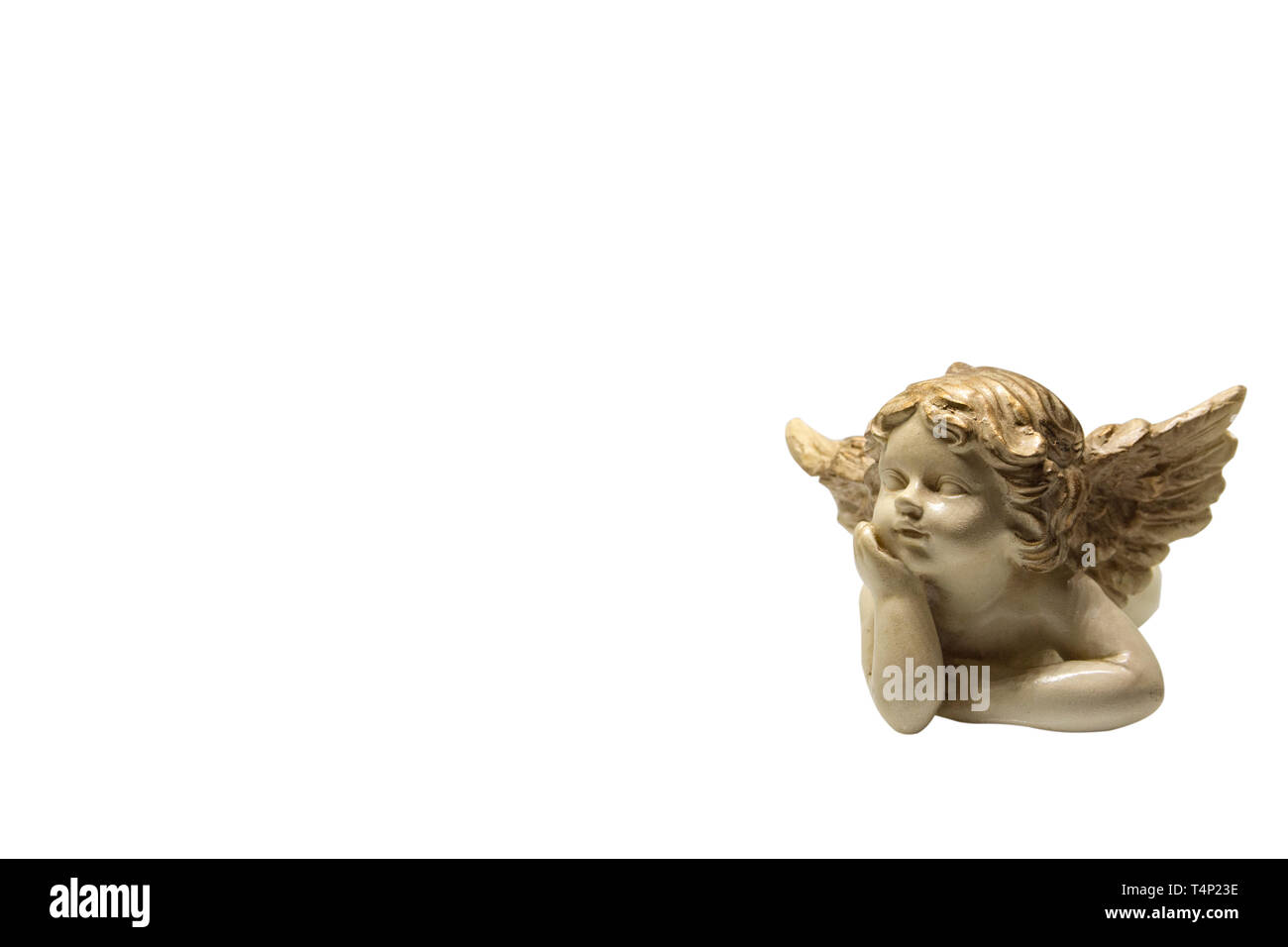 small figurine of lying little angel Stock Photo - Alamy