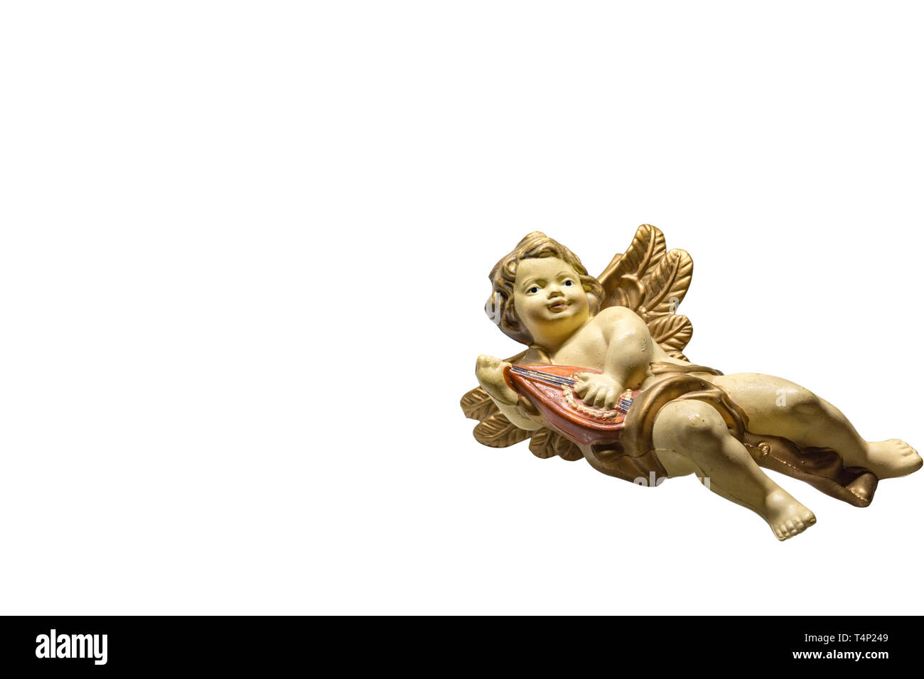 small figurine of lying little angel Stock Photo - Alamy