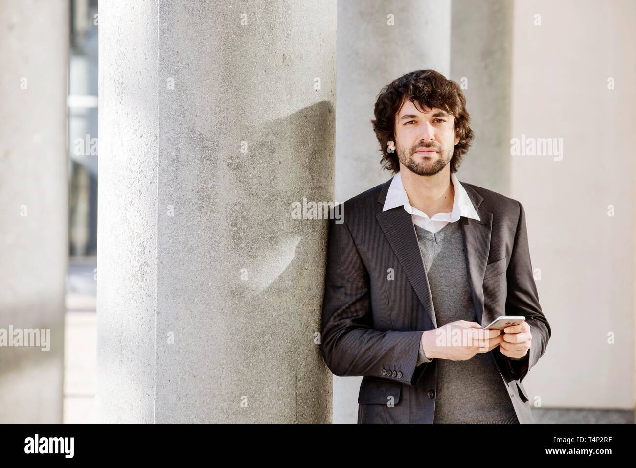 Lean on column hi-res stock photography and images - Alamy