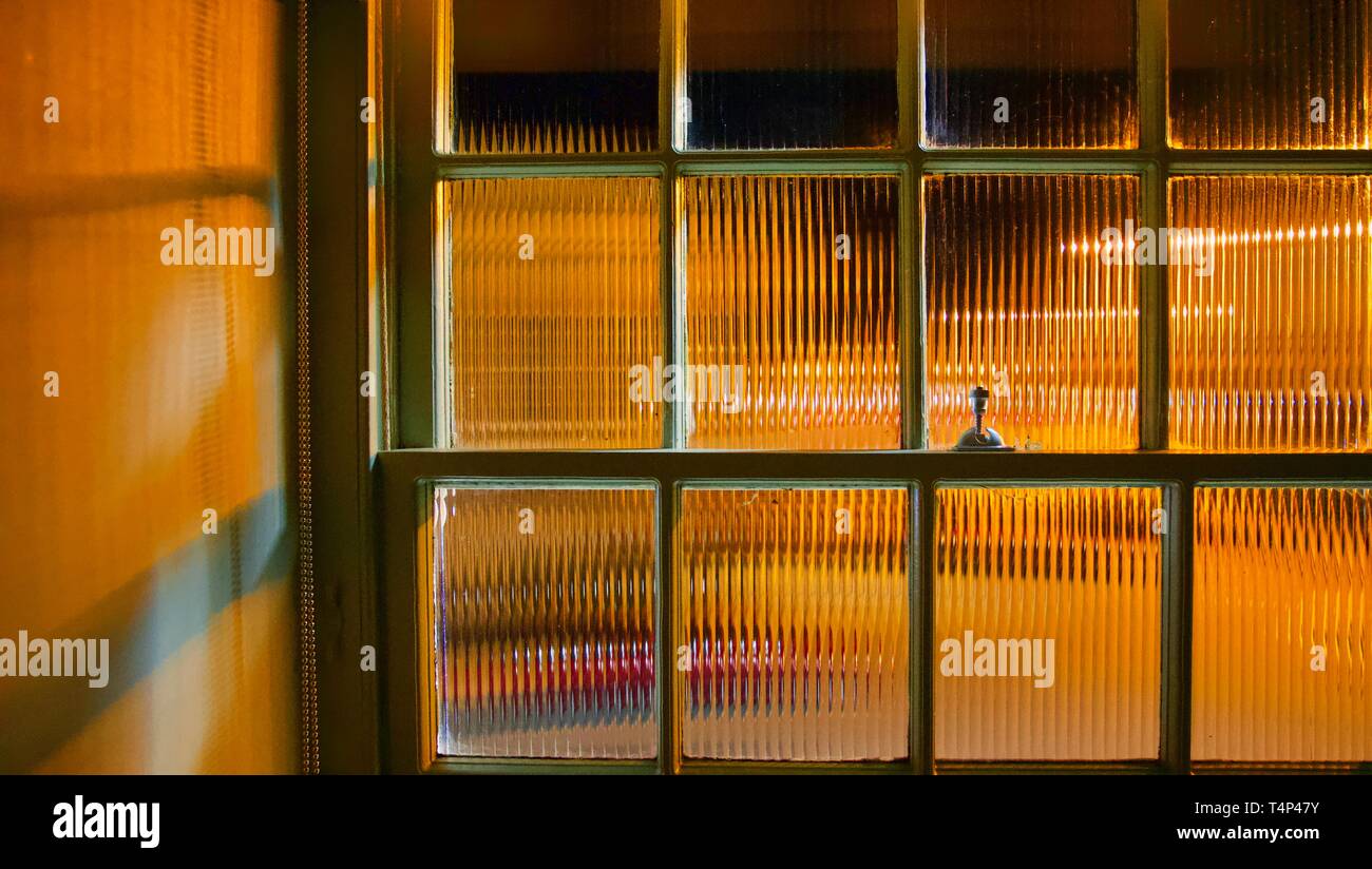 Early morning car lights through an opaque window Stock Photo - Alamy