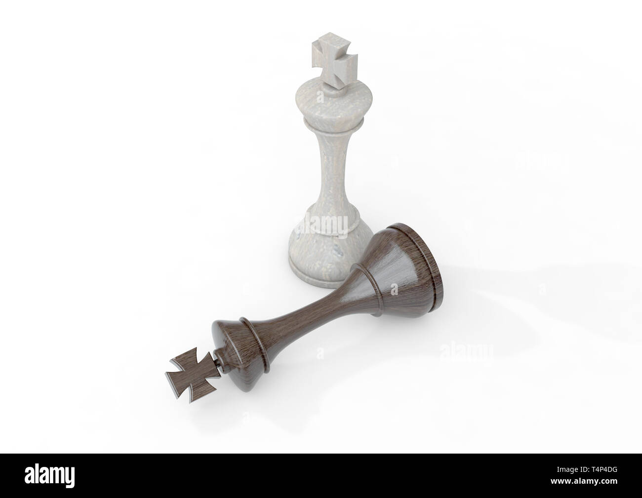 A white wooden chess king standing over the fallen black king on an ...