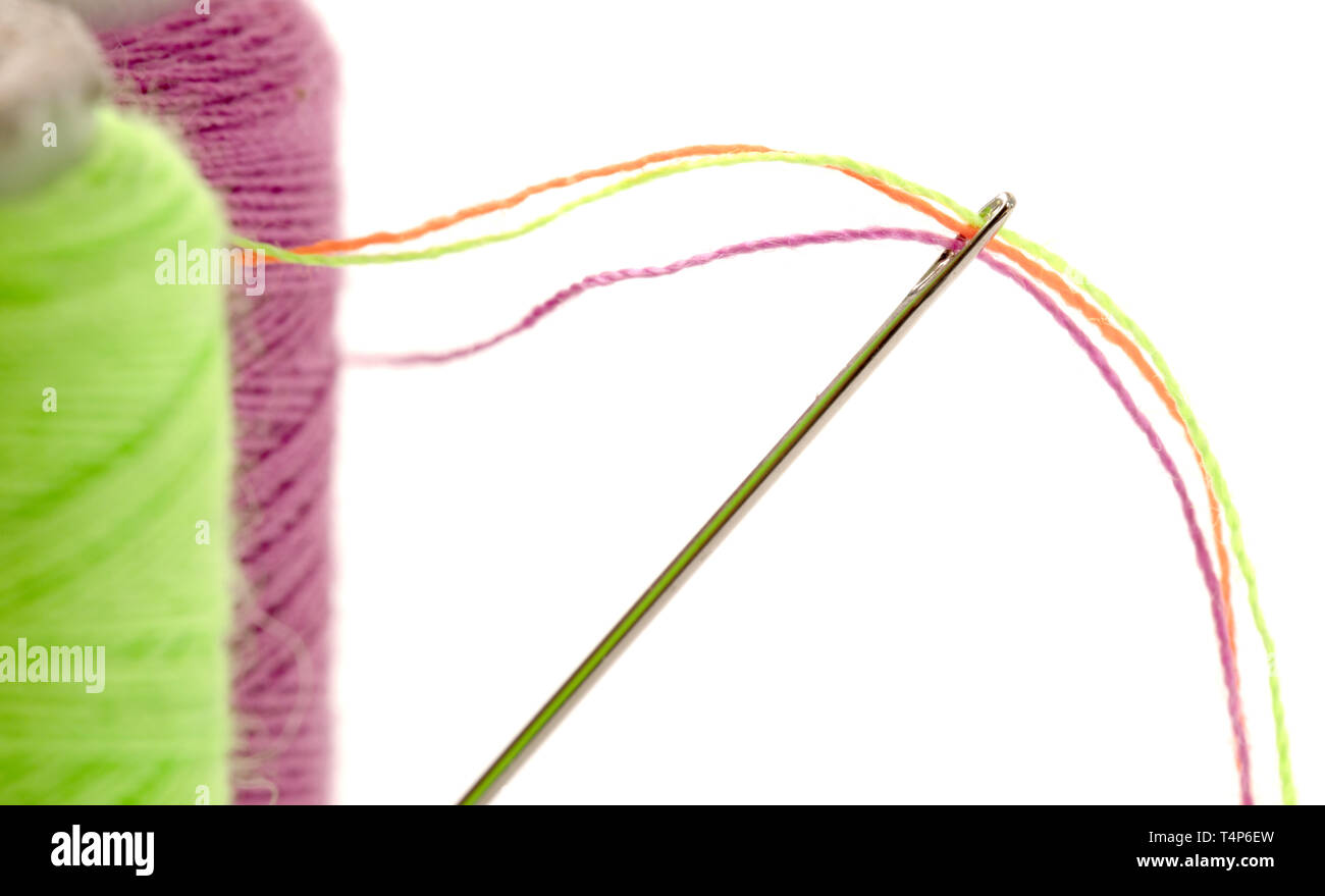 Sewing thread with needle isolated on a white background Stock Photo ...
