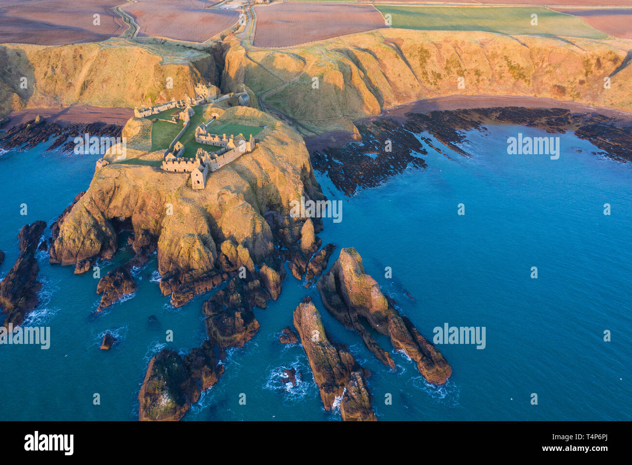 Aerial view of Dunnottar Castle a ruined medieval fortress located upon ...