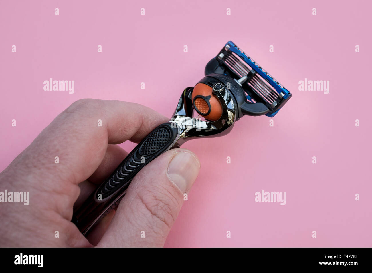 LONDON - APRIL 14, 2019: Gillette razor blade on pink background Stock ...