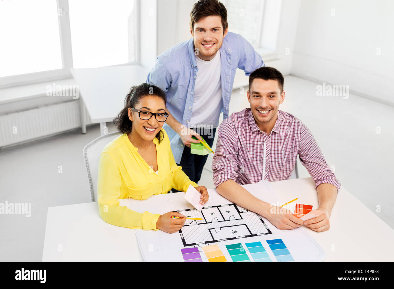 design and people concept - creative team of interior designers with ...