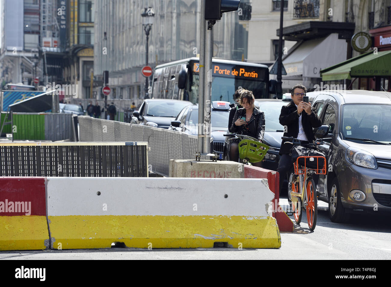 Vehicules and pedestrians struggling against traffic conditions in rue ...