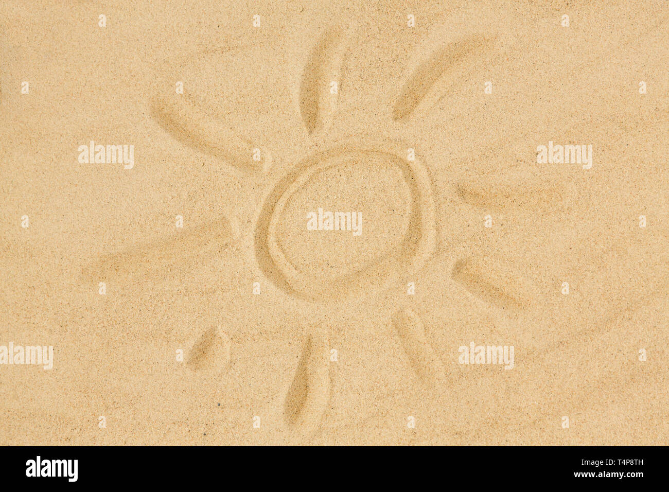 summer vacation concept - picture of sun in sand on beach Stock Photo ...
