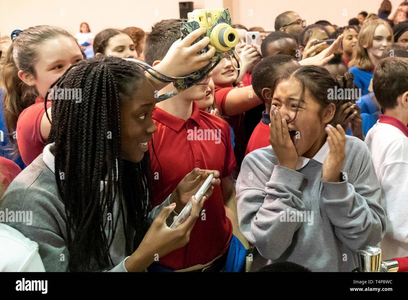 Students react as U.S First Lady Melania Trump arrives during an ...
