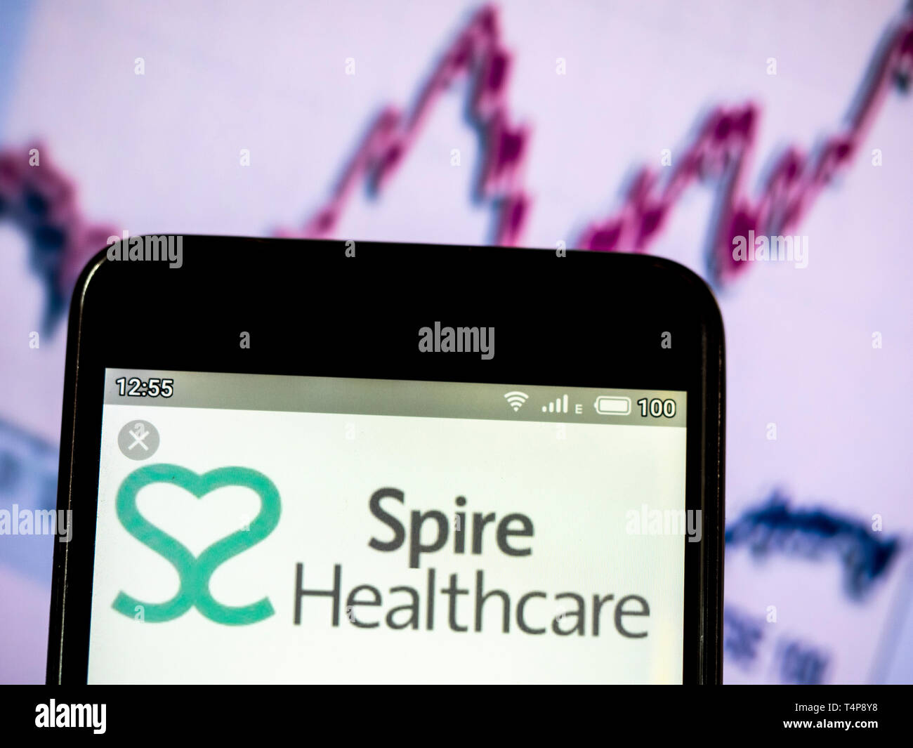 In this photo illustration a Spire Healthcare Group plc logo seen ...