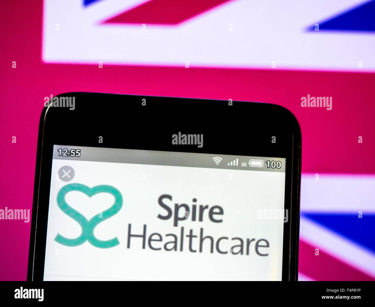 In this photo illustration a Spire Healthcare Group plc logo seen ...