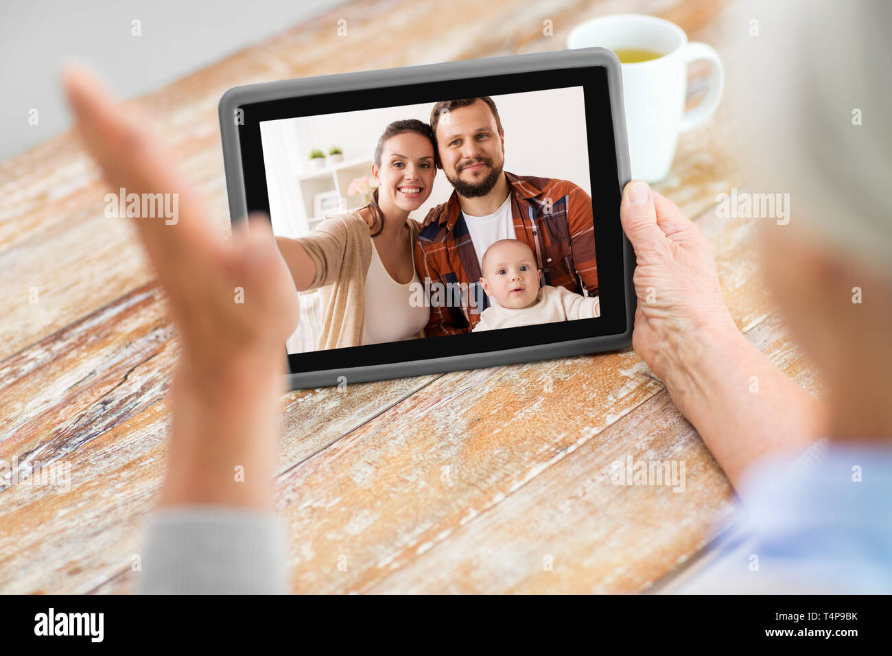 technology, communication and people concept - senior woman having ...