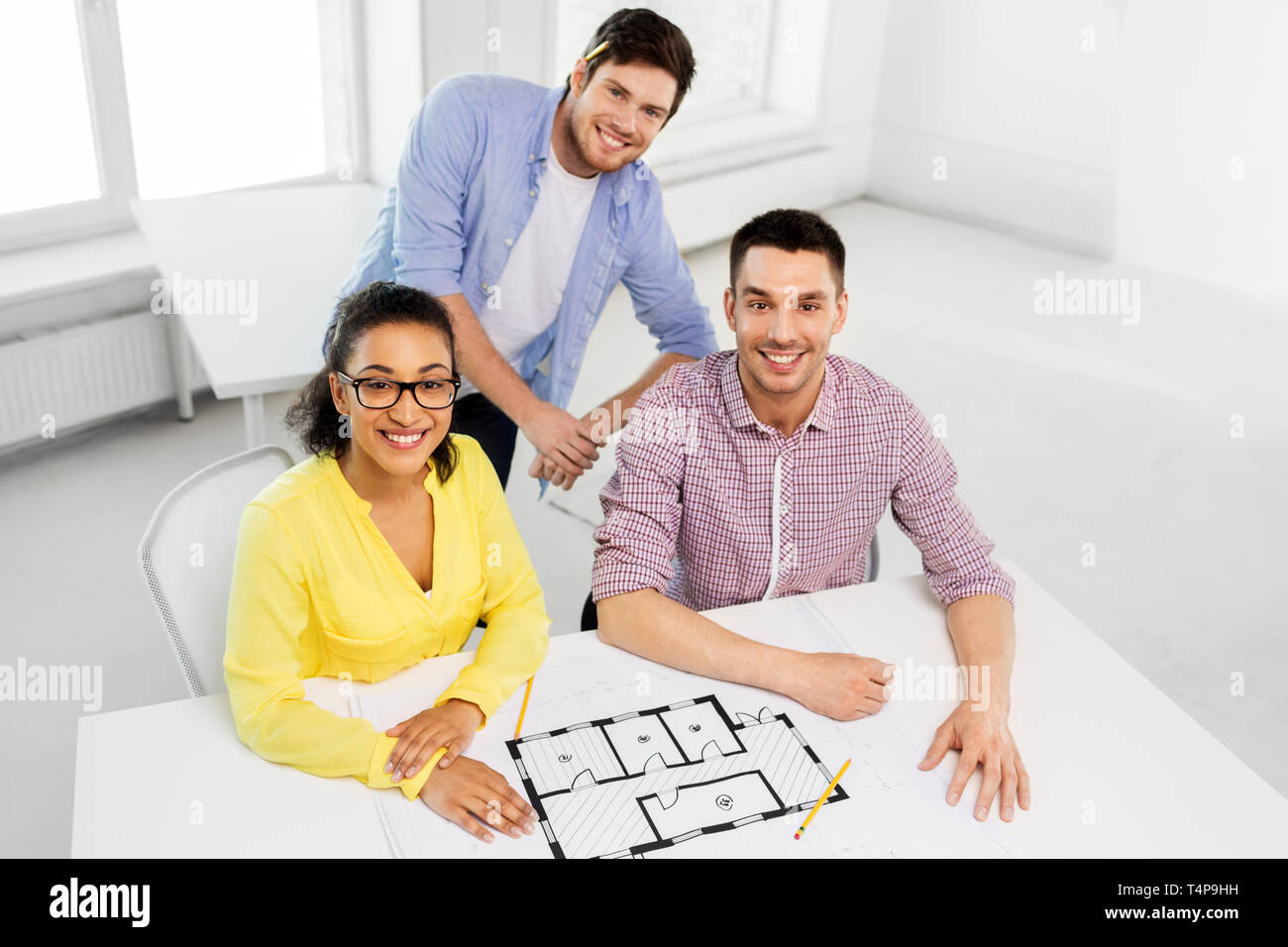 business, architecture and people concept - creative team of architects ...