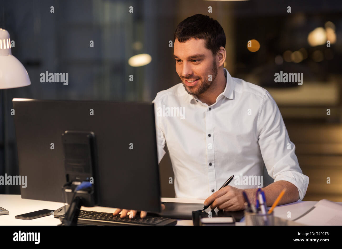 business, design and technology concept - creative man or designer with ...