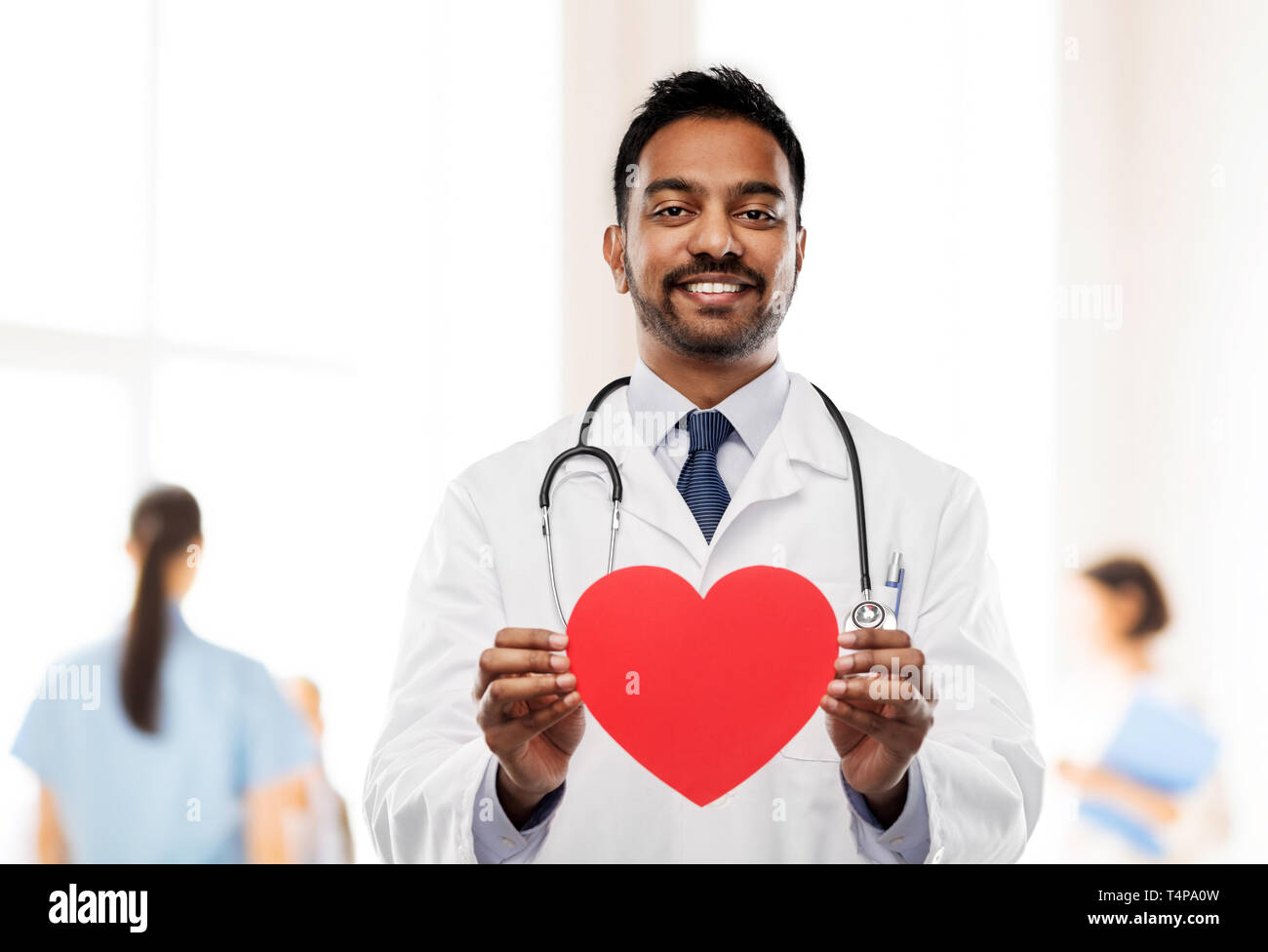 medicine, cardiology and healthcare concept - smiling indian male ...