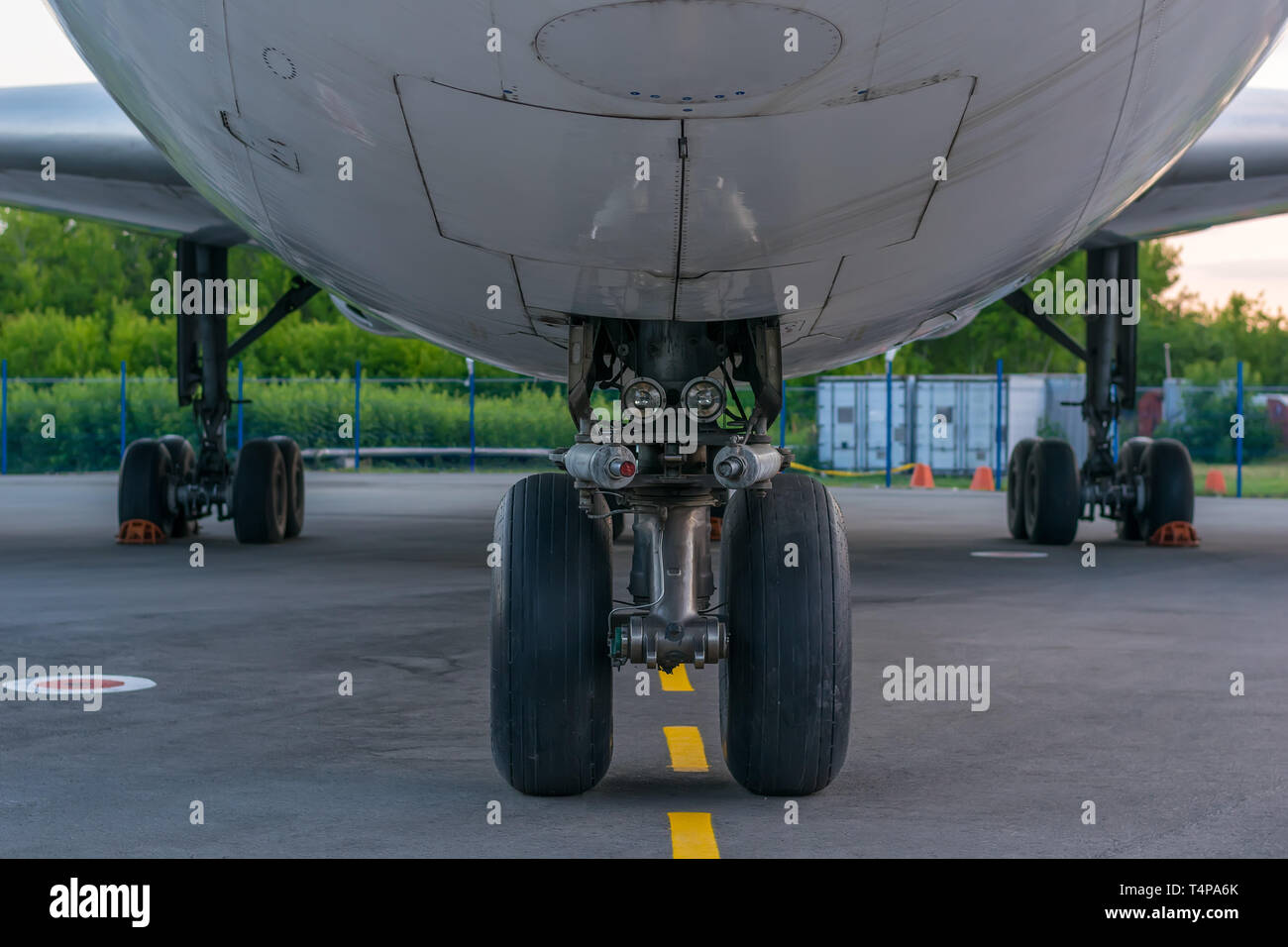 landing gear, wheels and bottom of the aircraft in the Parking lot of ...