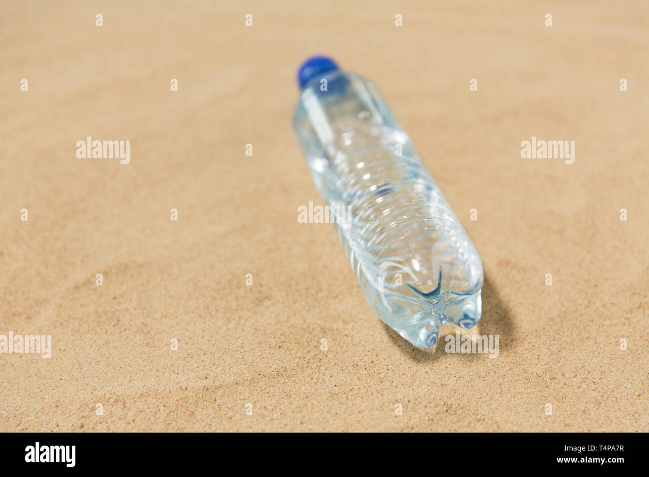 hydration and summer concept - bottle of water on beach sand Stock ...