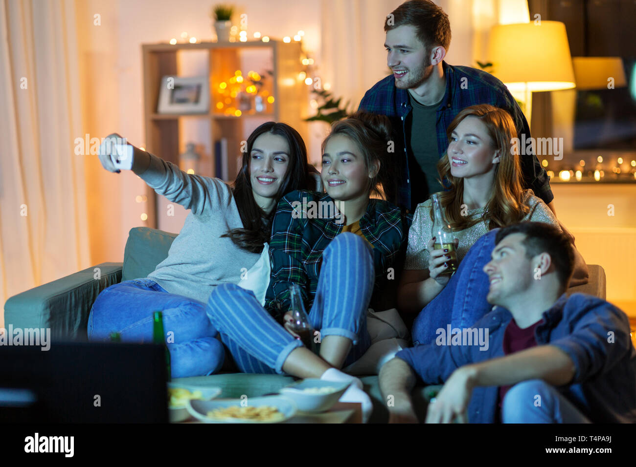 friendship, people, technology and entertainment concept - happy ...