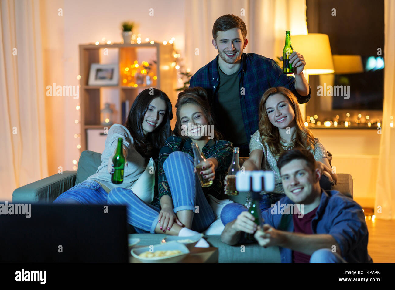 friendship, people, technology and entertainment concept - happy ...