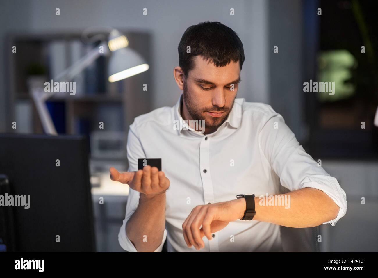 business, technology and internet of things concept - businessman using ...