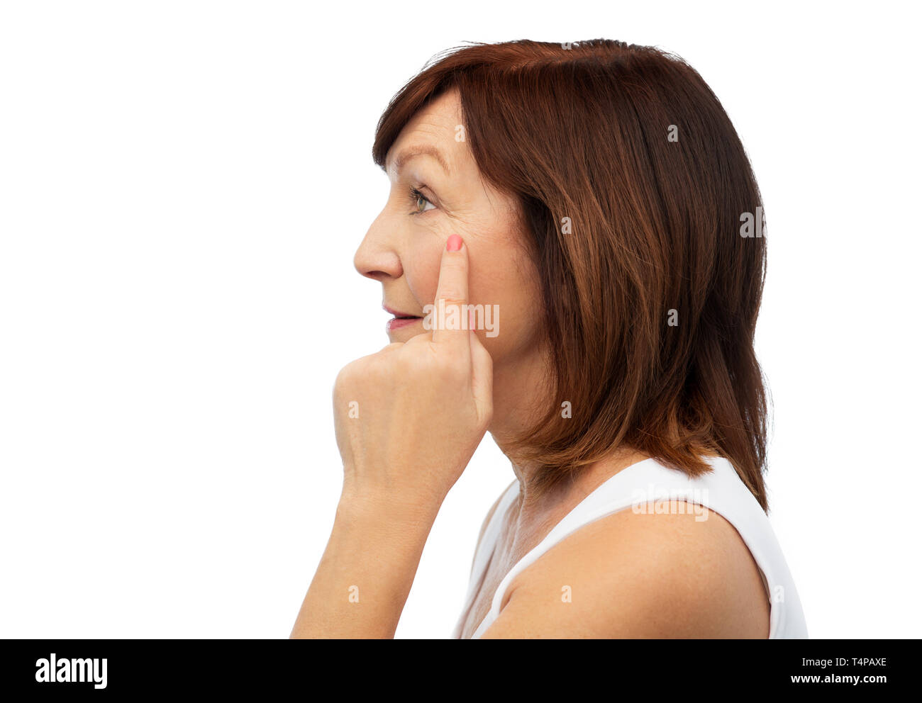 beauty, skin aging and old people concept - profile of senior woman ...