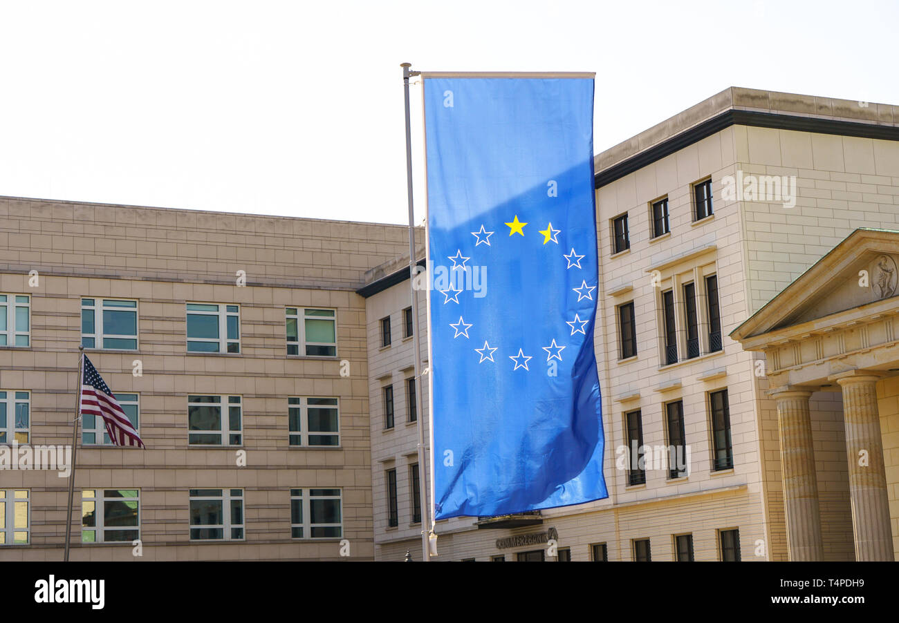 European flag missing stars with an American flag in the background ...