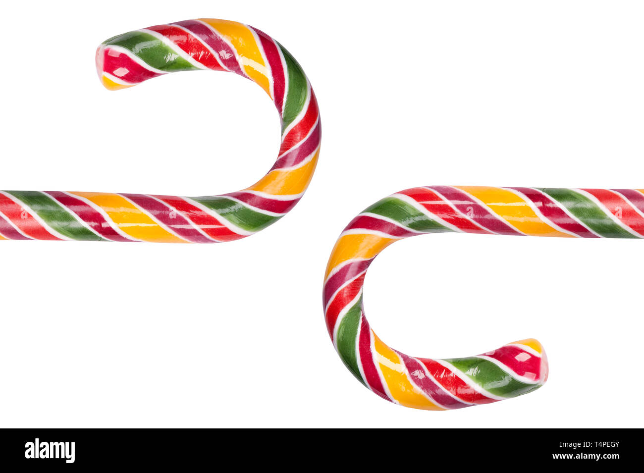 Two candy canes on white background Stock Photo - Alamy