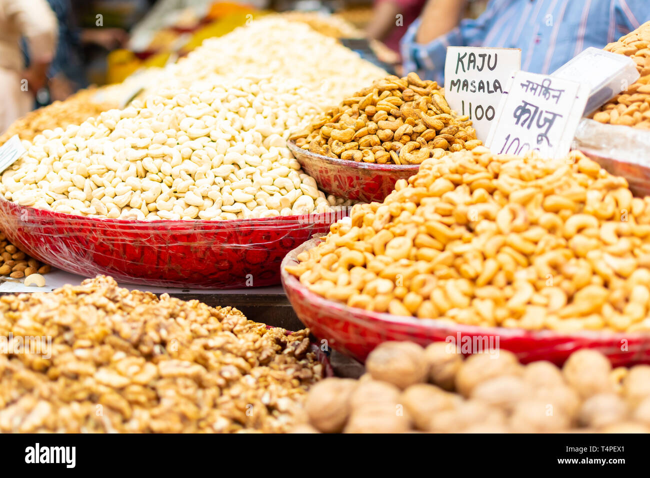 NEW DELHI, INDIA, MAR 30 2019 - Indian small shops with colorful spices ...