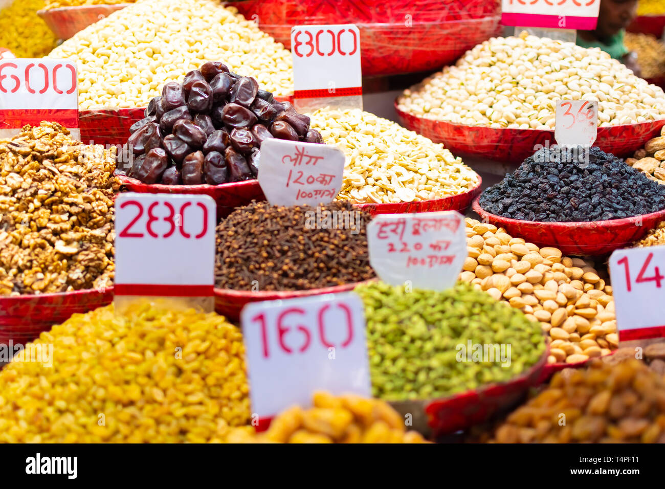NEW DELHI, INDIA, MAR 30 2019 - Indian small shops with colorful spices ...