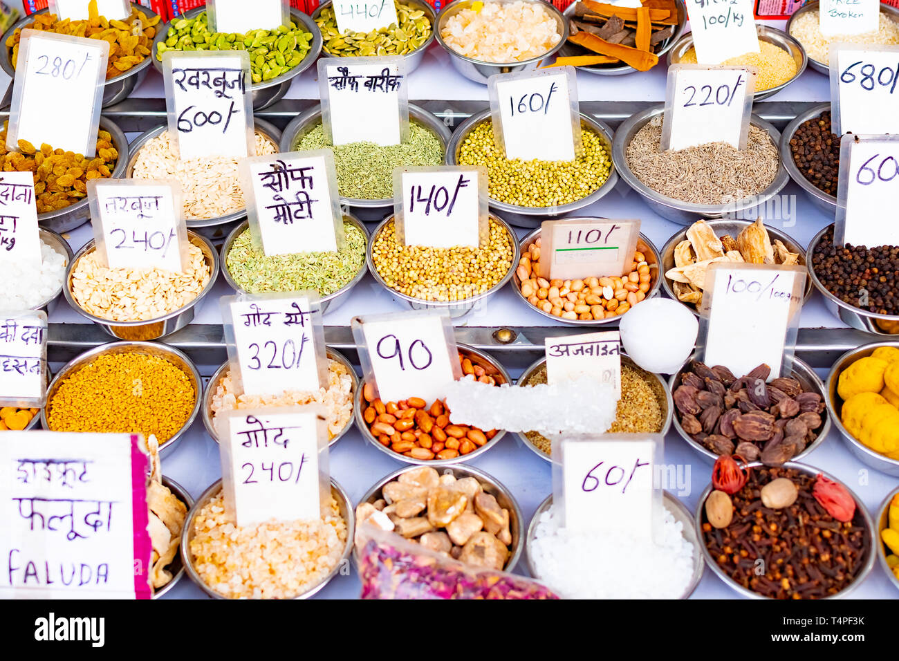 NEW DELHI, INDIA, MAR 30 2019 - Indian small shops with colorful spices ...