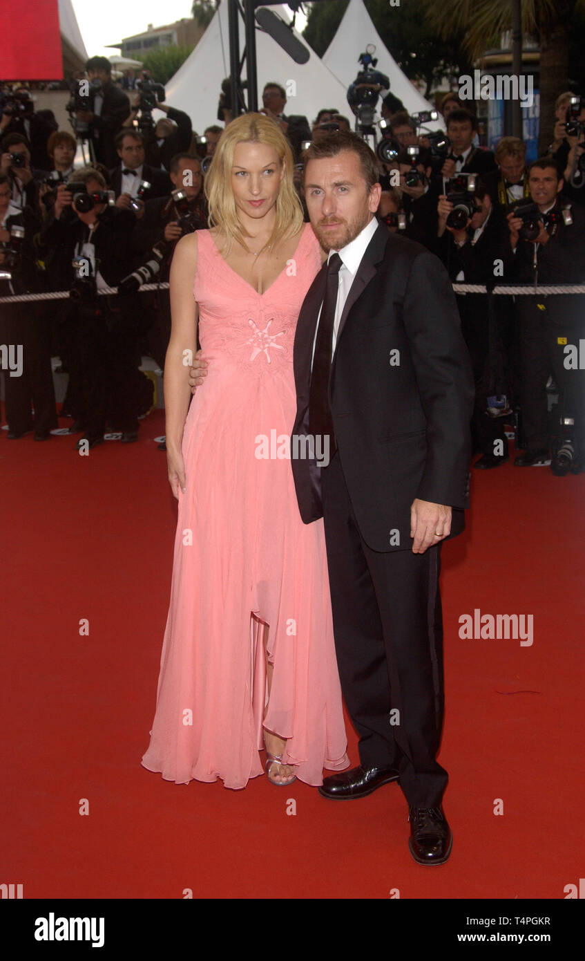 CANNES, FRANCE. May 22, 2004: TIM ROTH & date at the awards gala for ...