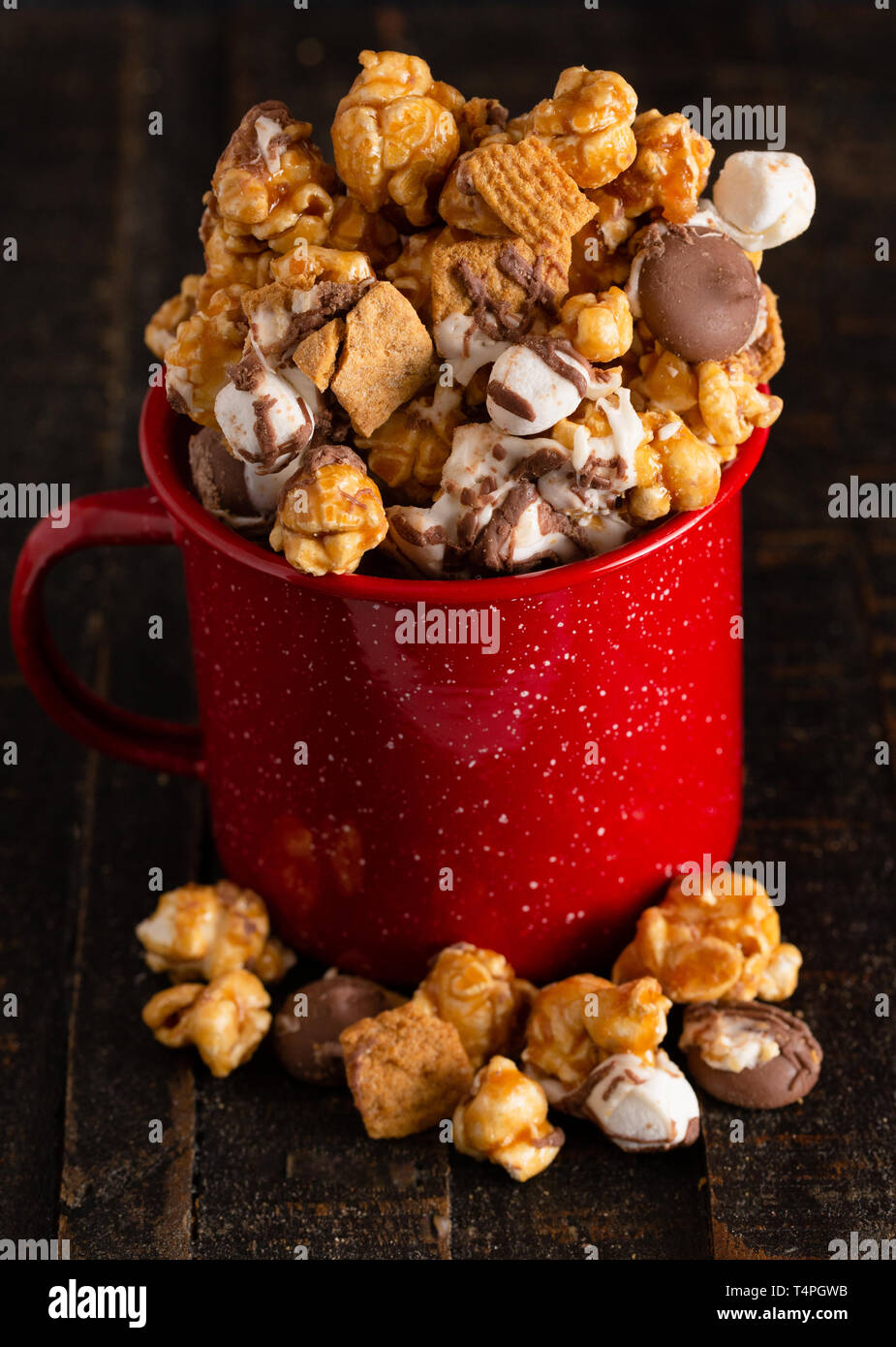 Smore Flavored Popcorn in a Red Camping Mug Stock Photo - Alamy