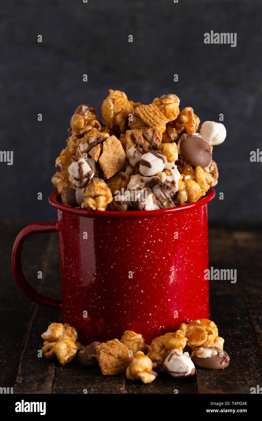 Smore Flavored Popcorn in a Red Camping Mug Stock Photo - Alamy