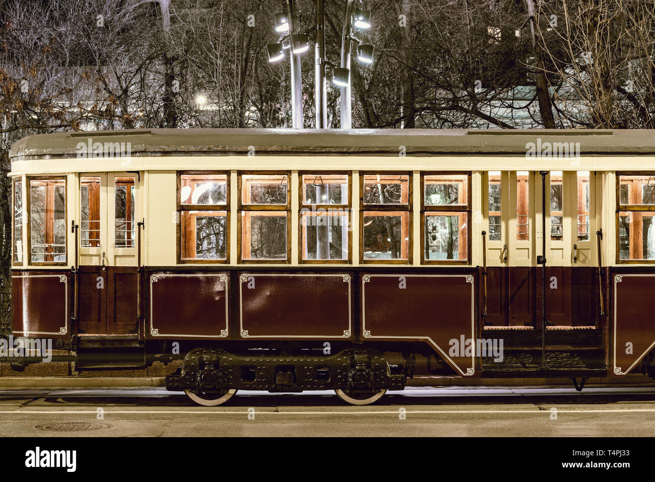 Old vintage tramway car on the night city street Stock Photo - Alamy
