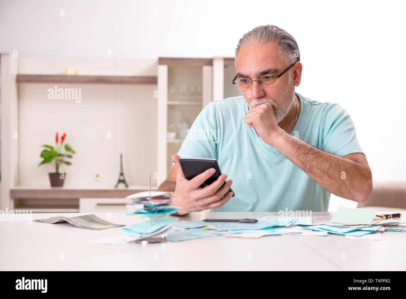 Planning family budget bearded senior hi-res stock photography and ...
