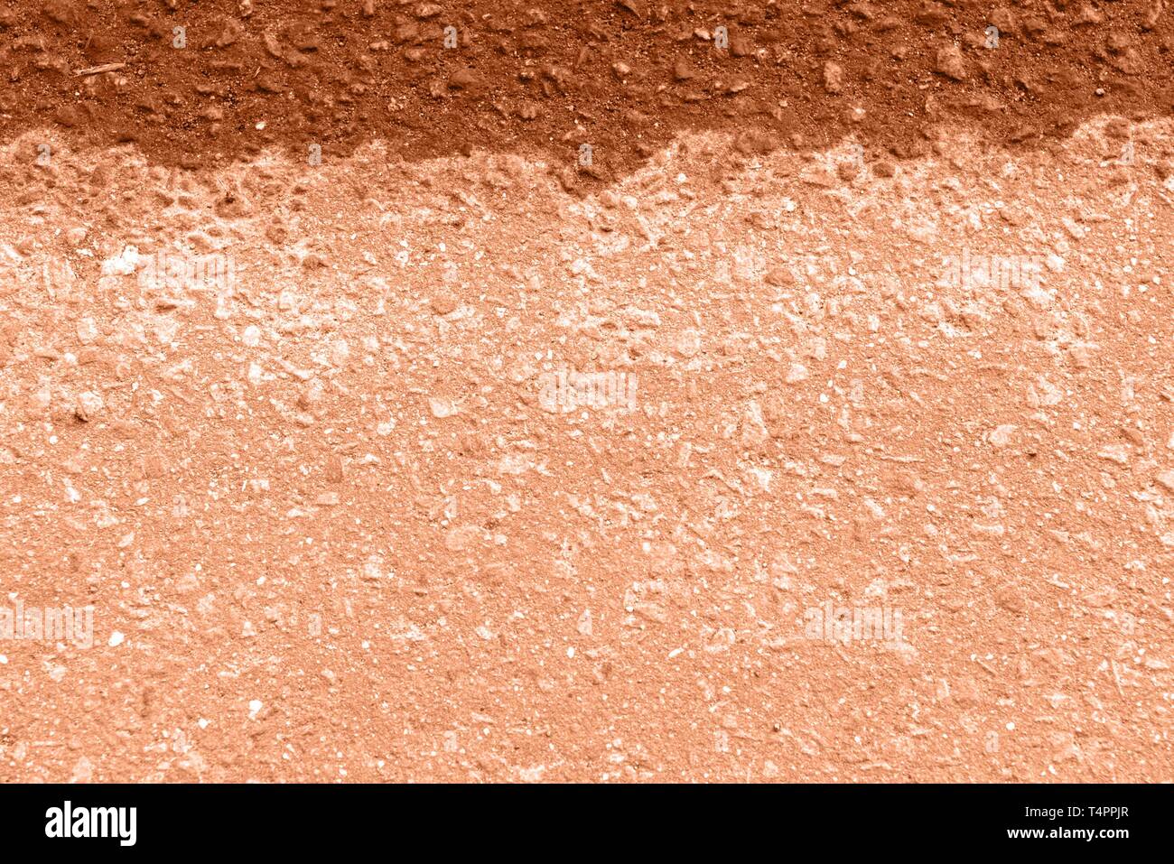 Old asphalt surface texture close up. Orange color toned background ...