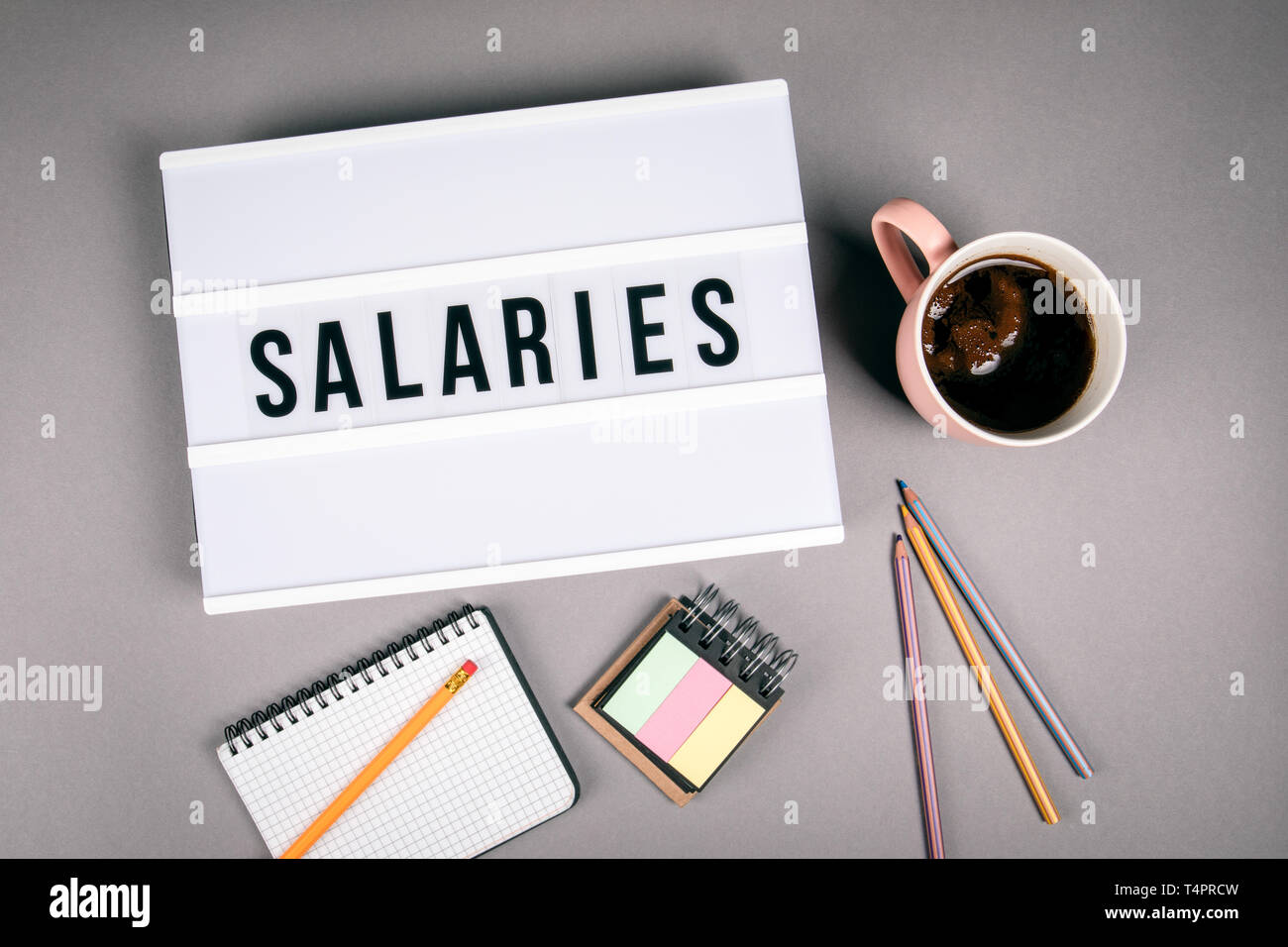 Salaries. Text in light box Stock Photo - Alamy