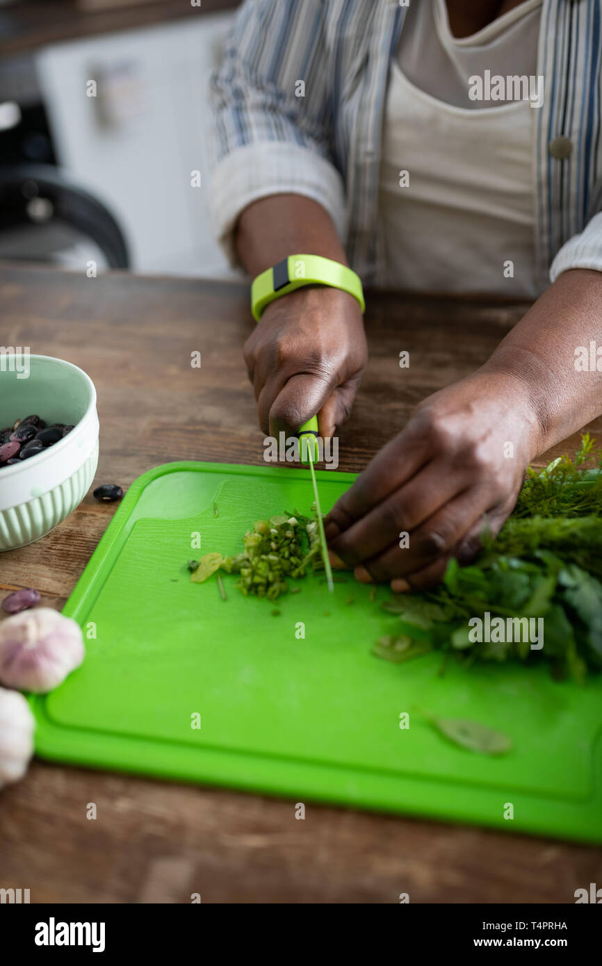 Be careful. Close up of female that cutting greenery, being alone in ...