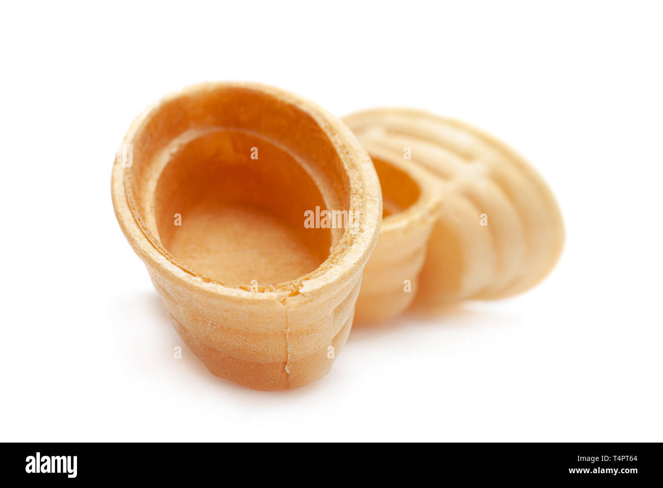 Empty baked tartlet closeup isolated on white background Stock Photo ...
