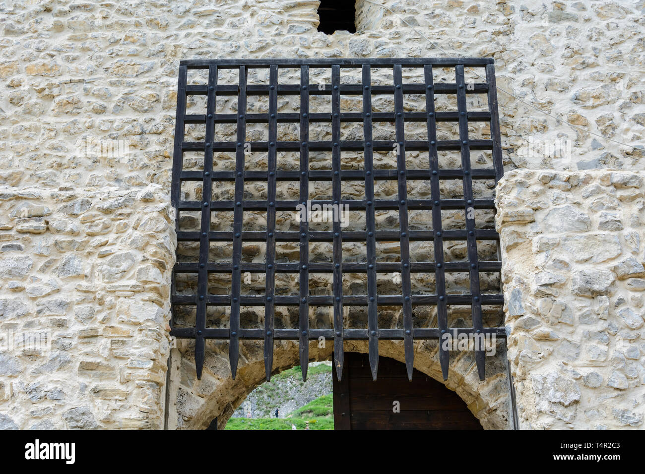 Medieval opened gate with spikes. wood gate Stock Photo - Alamy