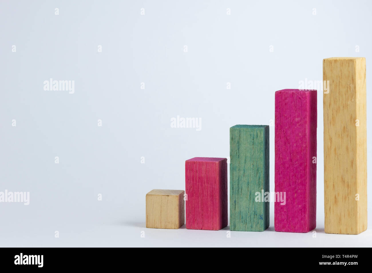 Close up image of colored wooden blocks as a graph Stock Photo - Alamy