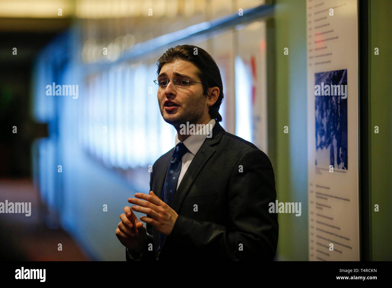United Nations. 17th Apr, 2019. Oliver Marsh speaks to tourists at the ...