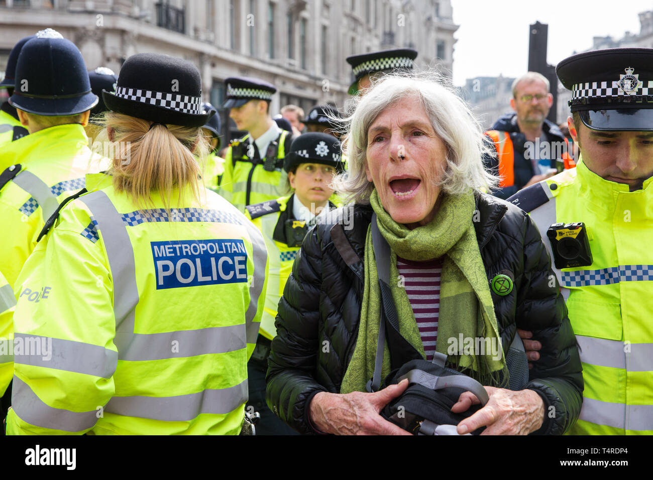 London, UK. 18th April 2019. Police officers move in to arrest a ...