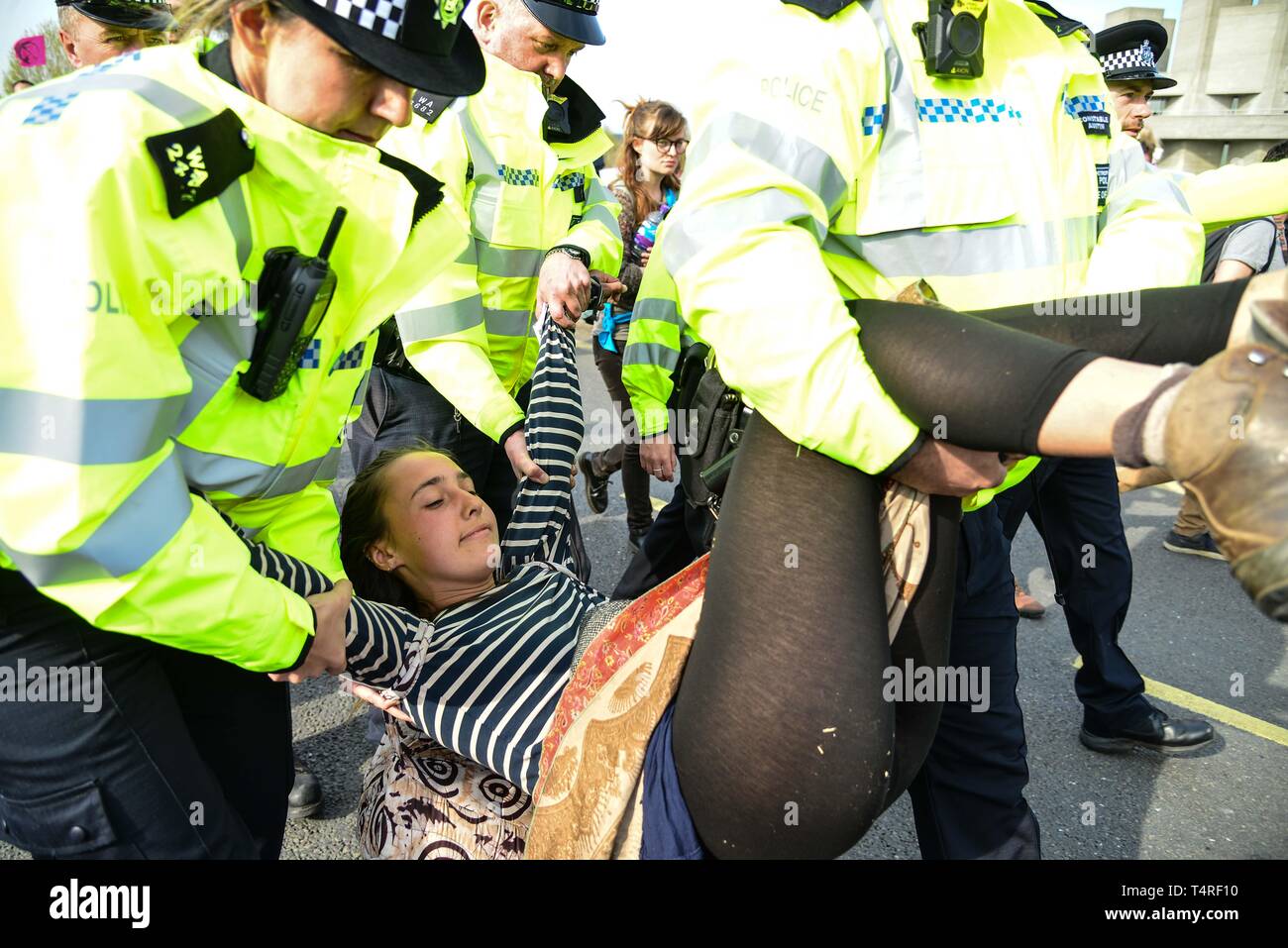 London, UK. 18th Apr, 2019. Police arrest protesters on Waterloo Bridge ...